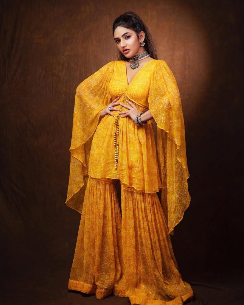 Your shy girl in a shiny sharara - Samyakk: Sarees | Sherwani | Salwar ...
